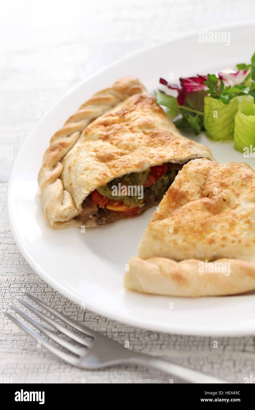 calzone, folded stuffed pizza, italian food Stock Photo - Alamy