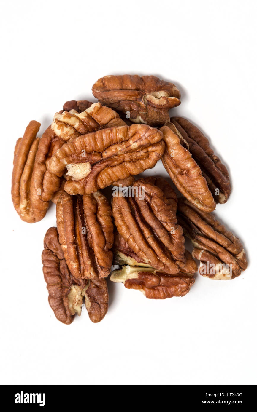 Stack of Pecans isolated on white background Stock Photo - Alamy