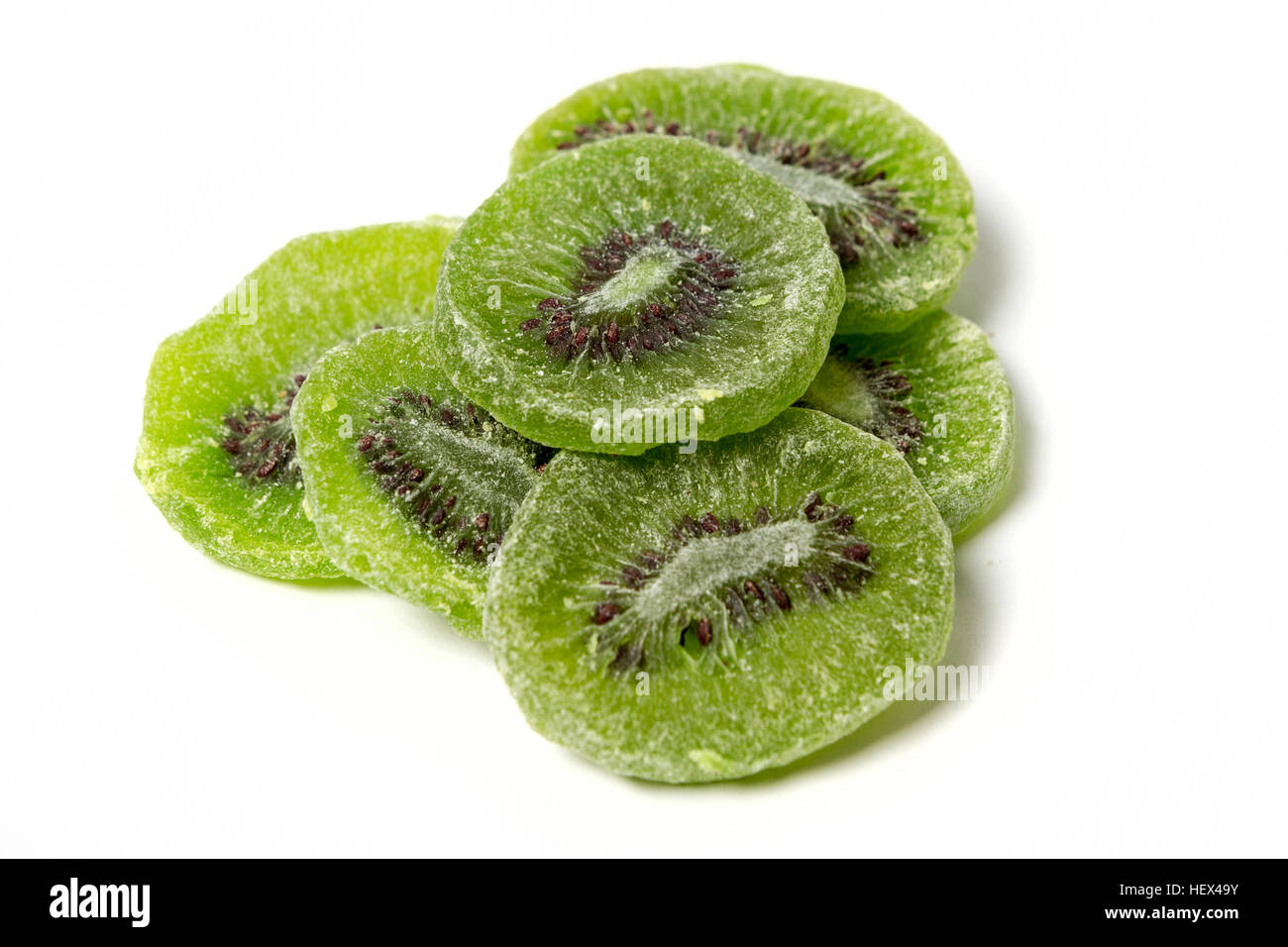 Pile of dried kiwi pieces isolated on white background Stock Photo - Alamy