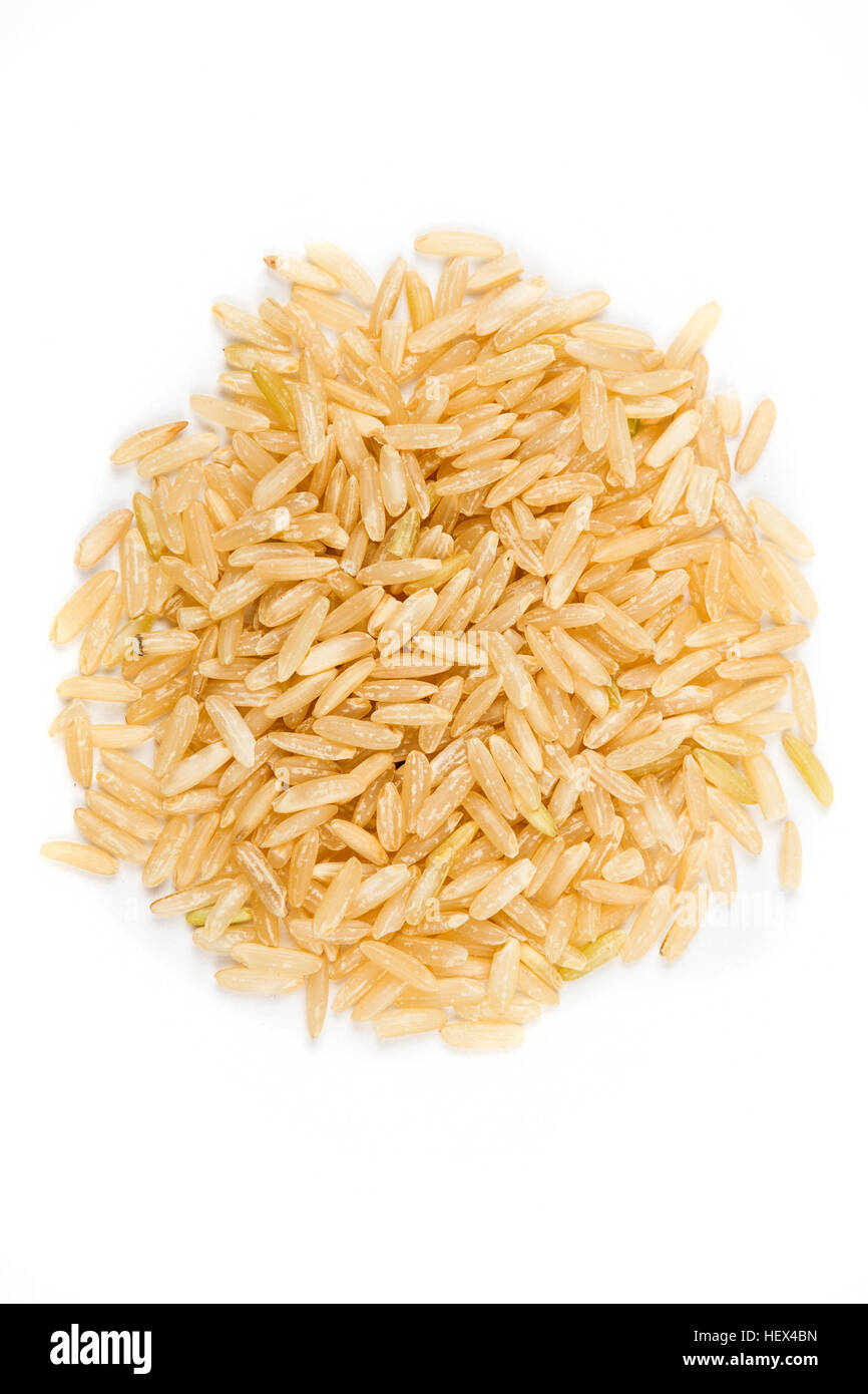 Long grain brown rice isolated on white background Stock Photo - Alamy