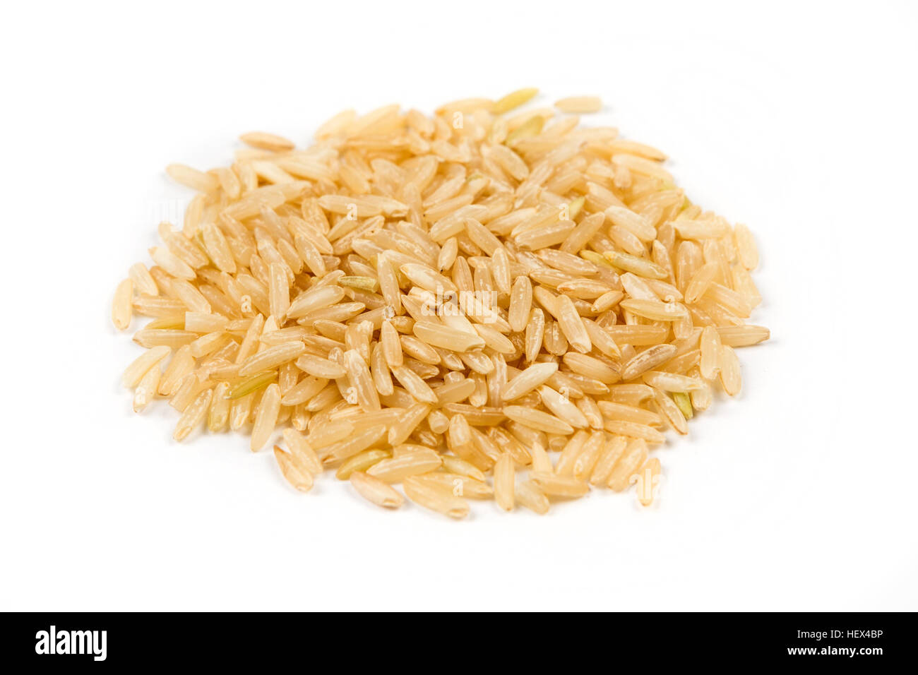 Long grain brown rice isolated on white background Stock Photo - Alamy