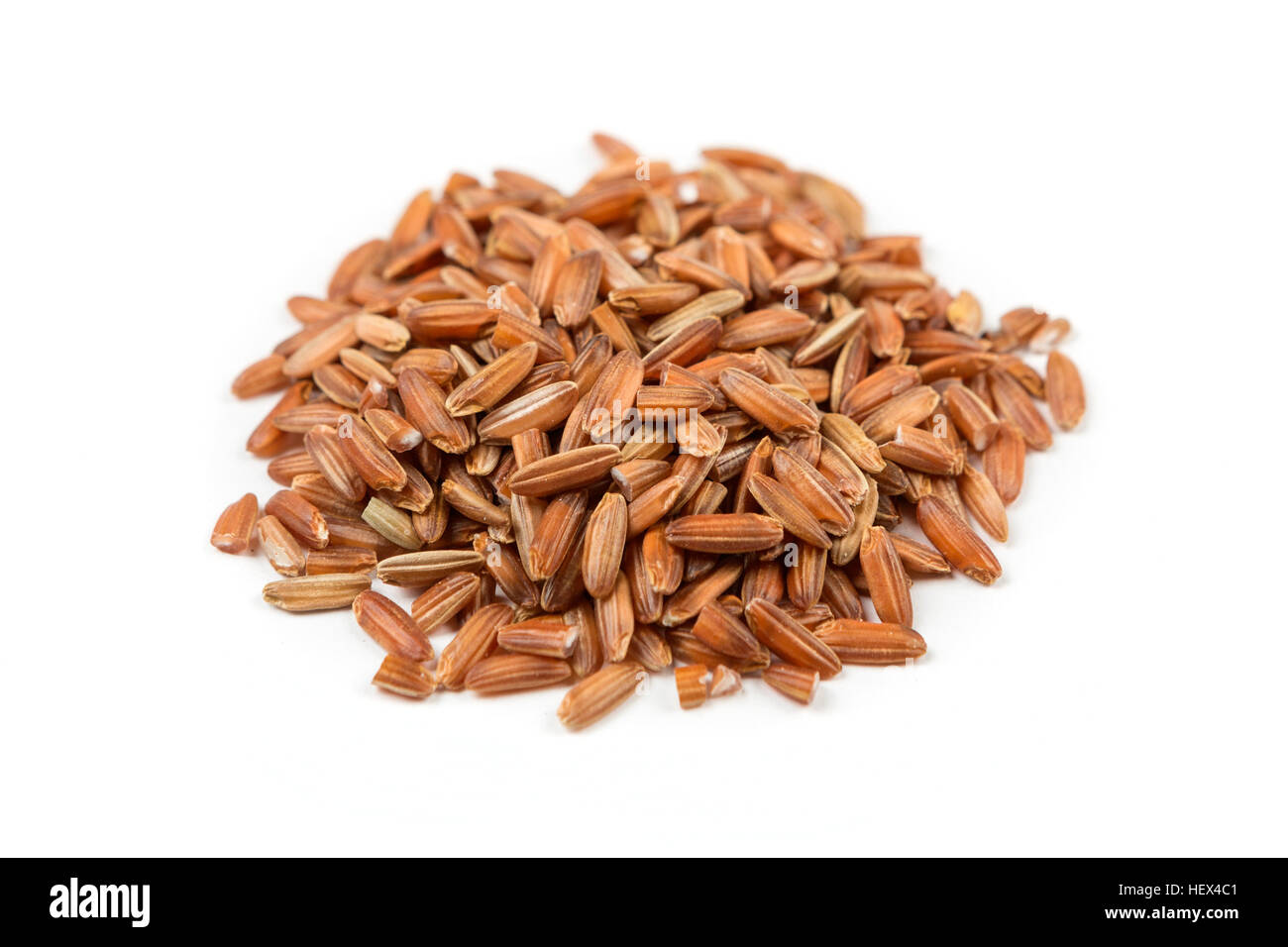 Wehani red rice isolated on white background Stock Photo - Alamy