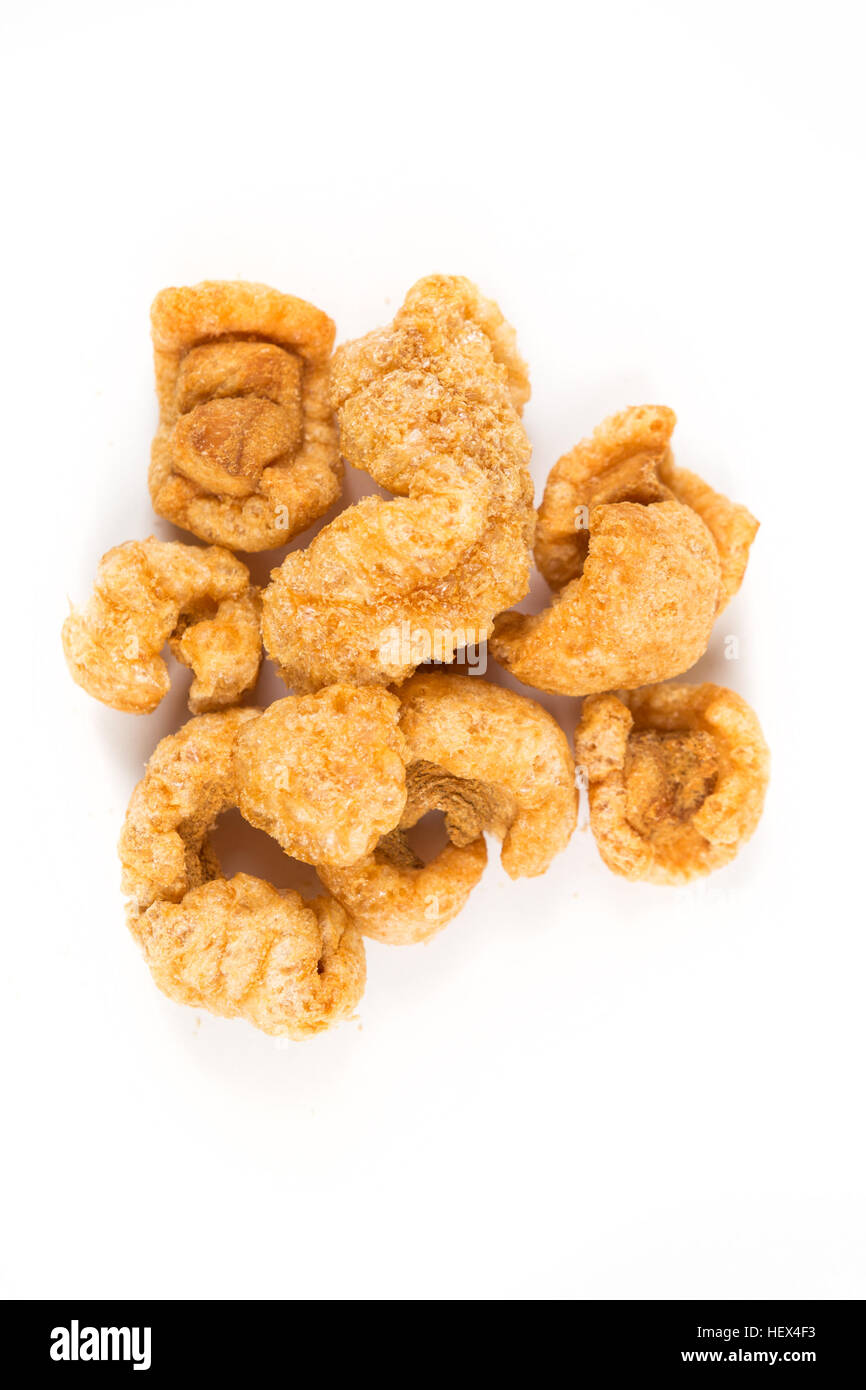 Pork rinds isolated on white background Stock Photo - Alamy