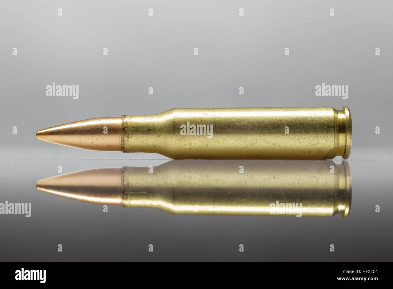 single bullet on white background shot in the studio Stock Photo - Alamy
