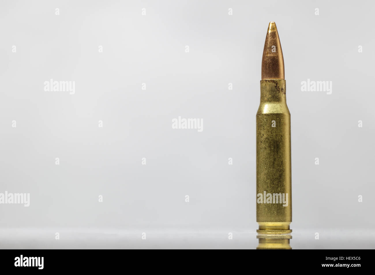 single bullet on white background shot in the studio Stock Photo - Alamy