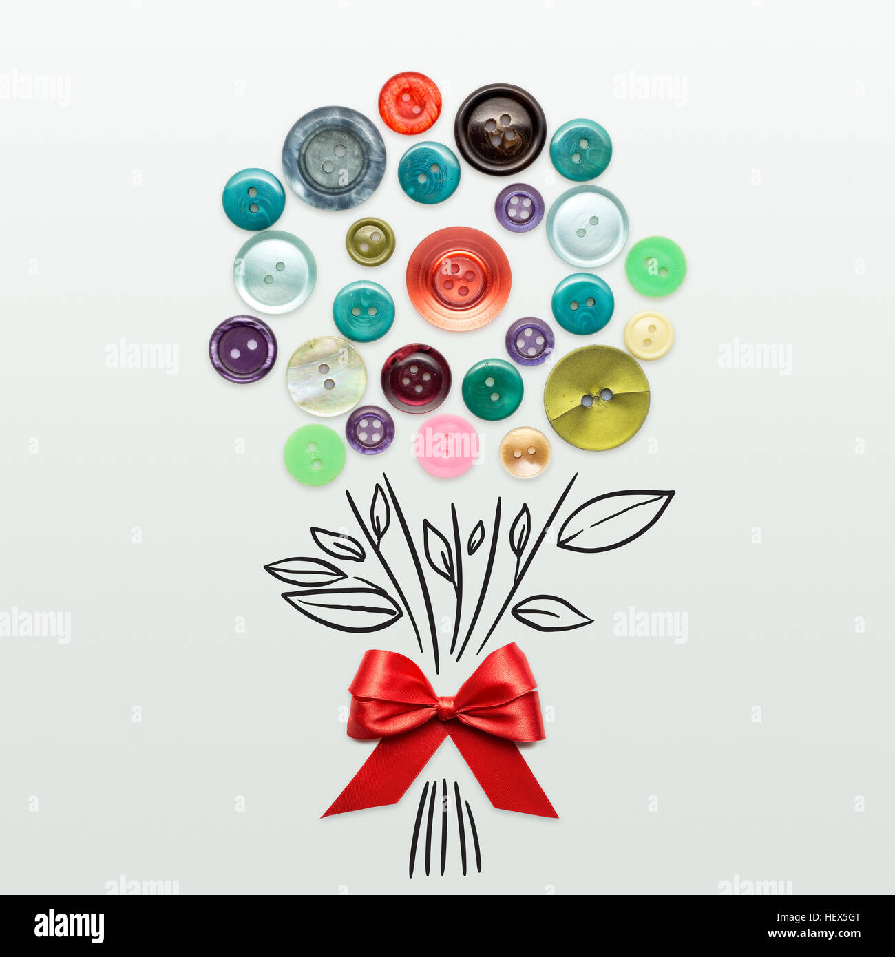 Creative valentines concept photo of a bouquet mad of buttons with a ...