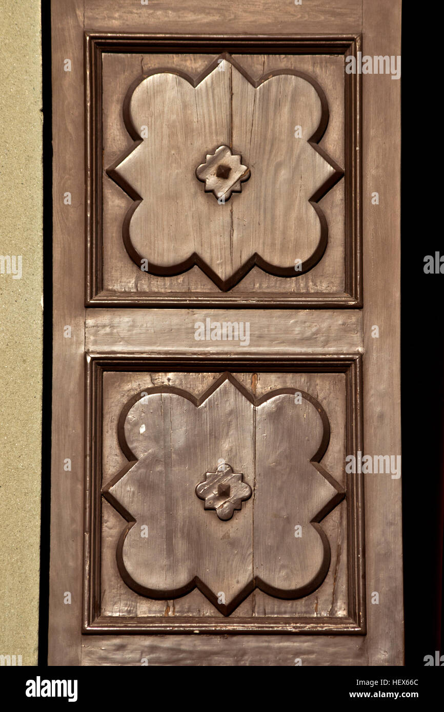 geometric ornaments of ancient brown color wood door Stock Photo - Alamy
