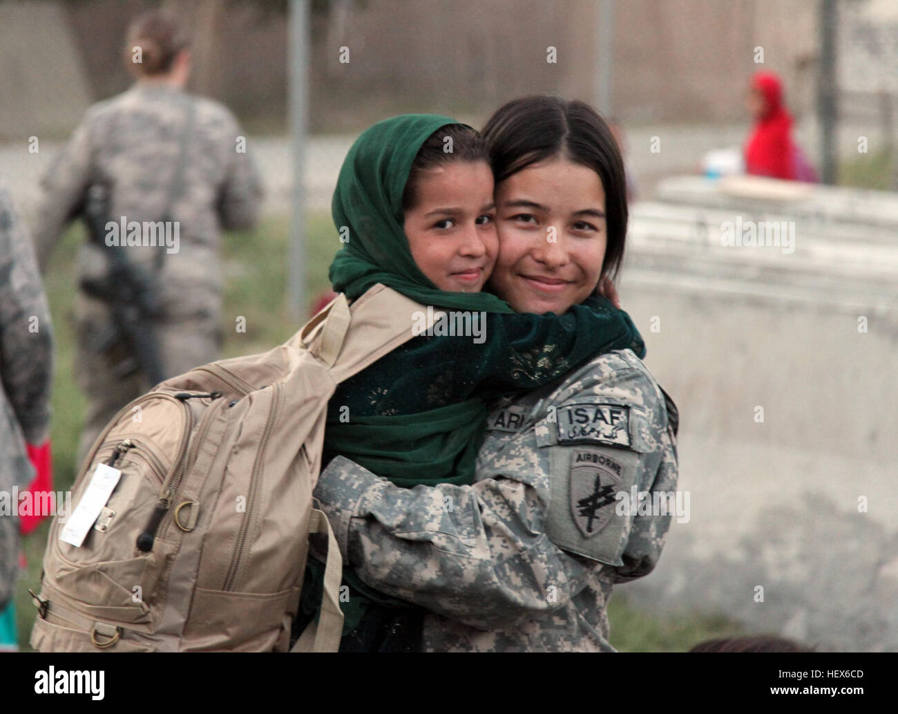 U.S. Army Spc. Jessica Walker from Killingworth, Conn., shares a hug ...