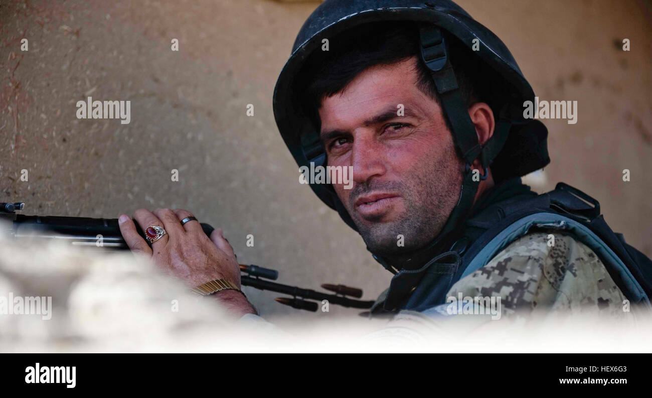 A policeman with the 2nd Battalion, 3rd Afghan National Civil Order ...