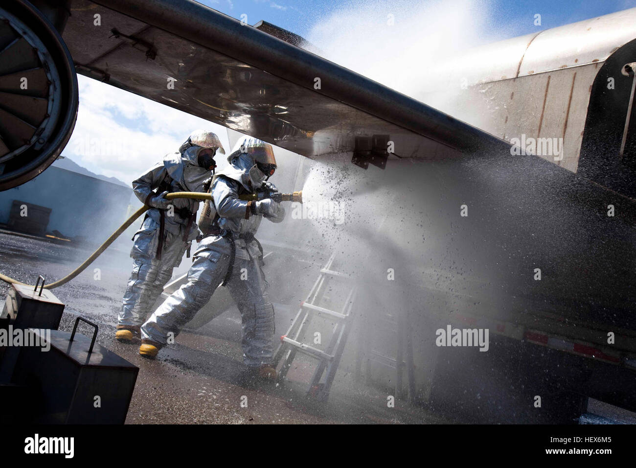 Firefighters fighting fire arff training hi-res stock photography and ...