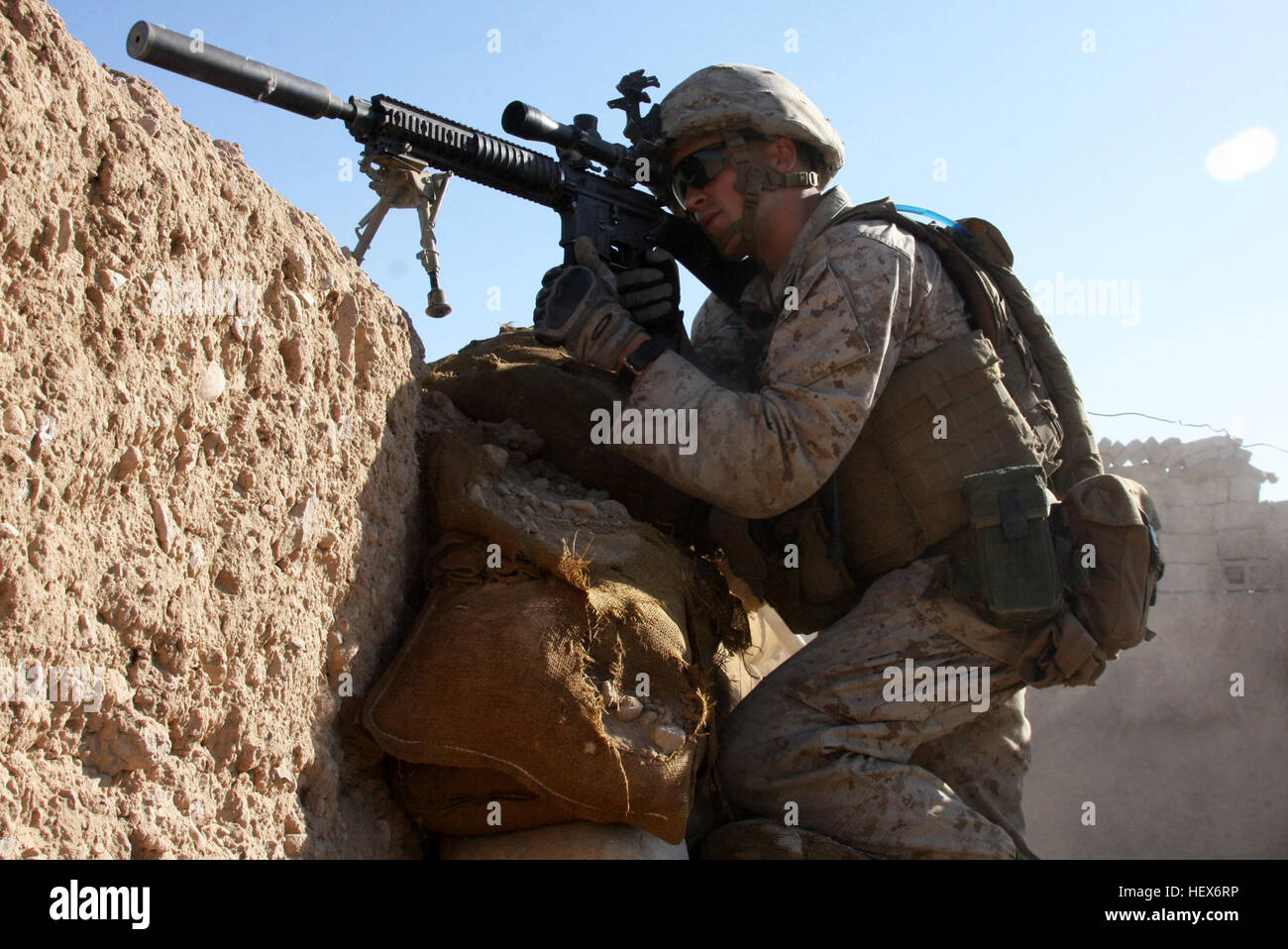 U.S. Marine Corps Lance Cpl. Steven J. Zandstra provides security at a ...