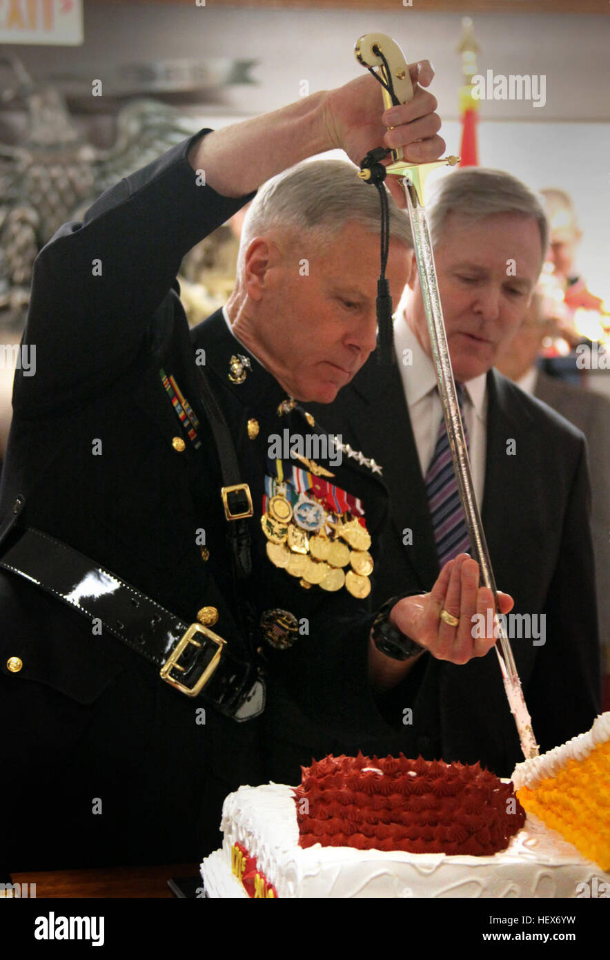 Gen. James F. Amos, the 35th commandant of Marine Corps, cuts the ...