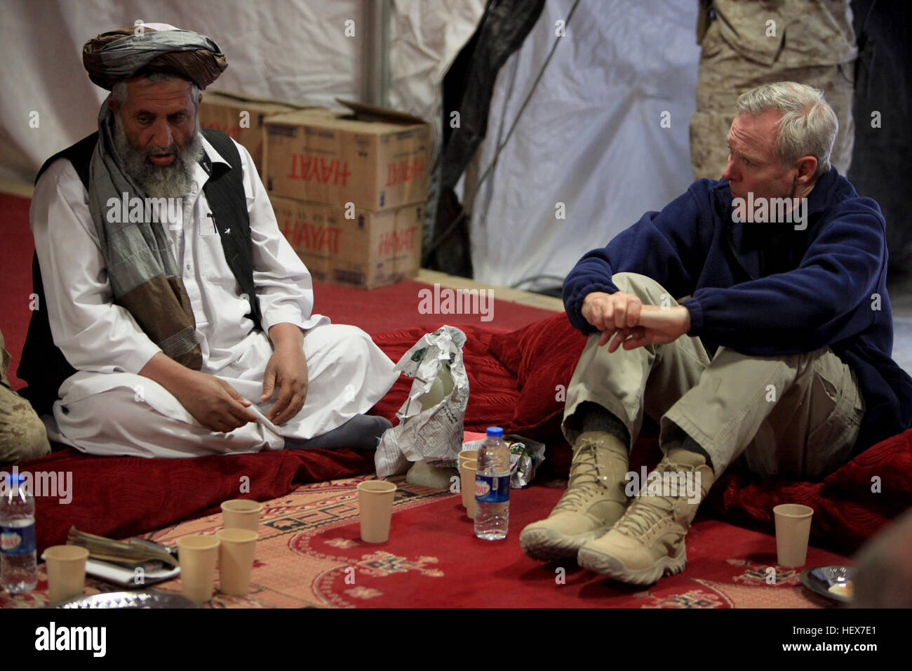 Secretary of the Navy Ray E. Mabus, right, conducts a shura, or meeting ...