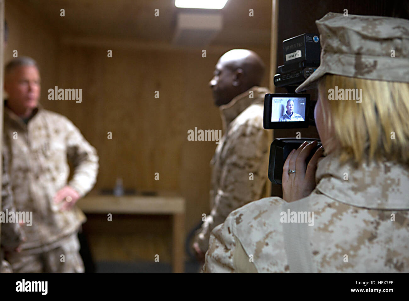 Commandant of the Marine Corps, Gen. James F. Amos, speaks with sailors ...