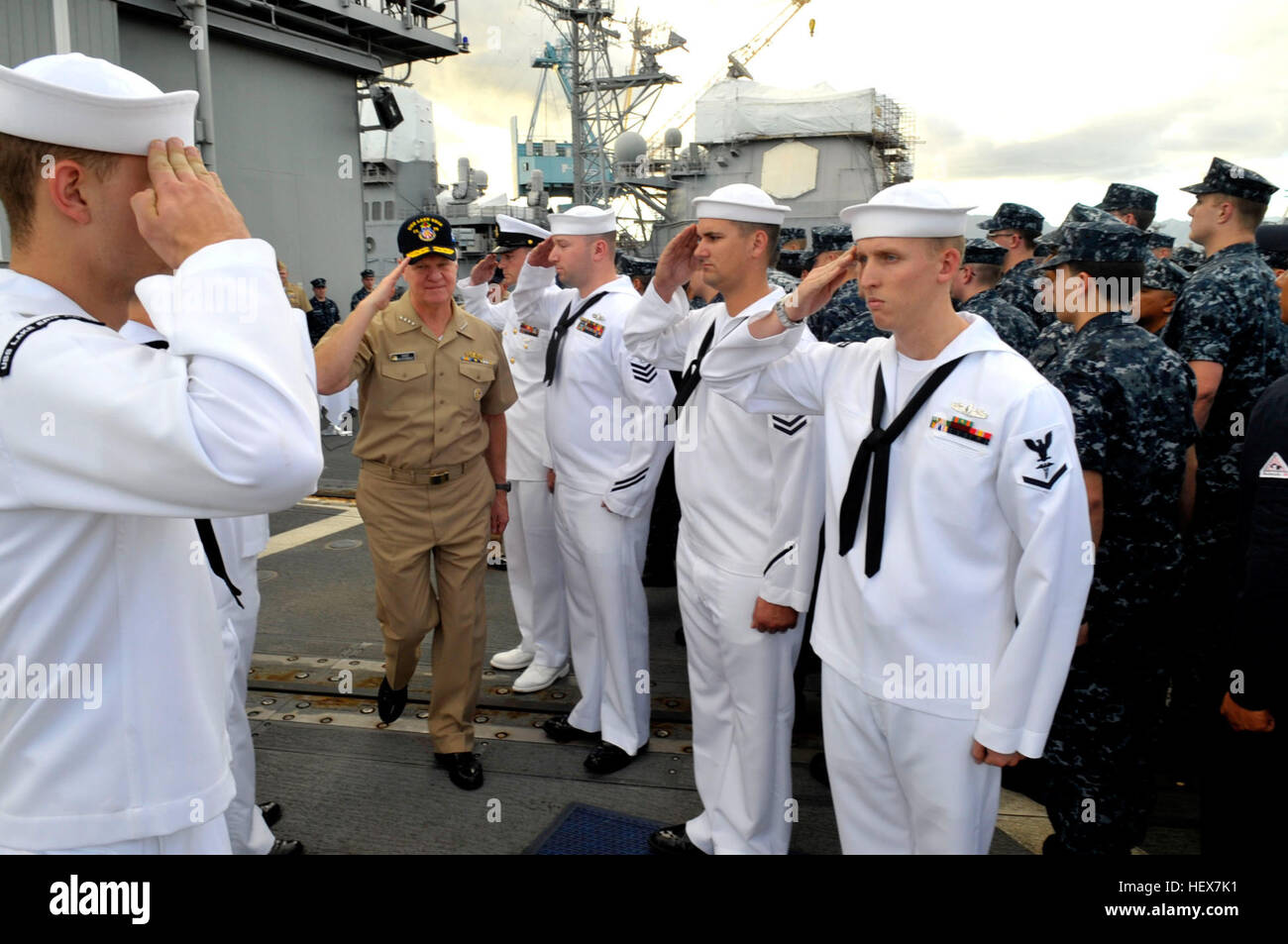 Chief of Naval Operations Adm. Gary Roughead salutes while departing ...