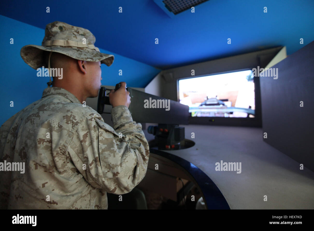 A Marine machine gunner with Alpha Company, 1st Battalion, 23rd Marine ...
