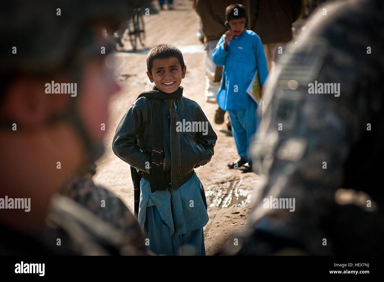 NANGARHAR PROVINCE, Afghanistan – An Afghan boy smiles and laughs as U ...