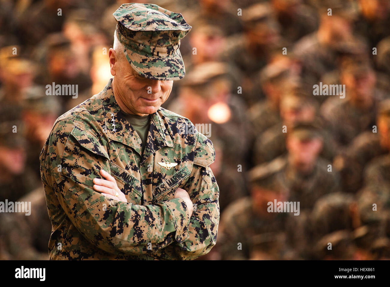 Gen. James F. Amos, 35th commandant of the Marine Corps, grins as Sgt ...