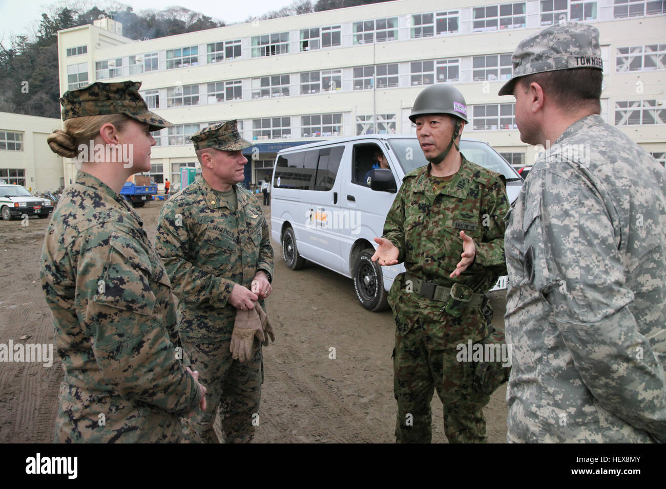 Japan Ground Self-Defense Force Col. Hisanori Fukada, center right, the ...