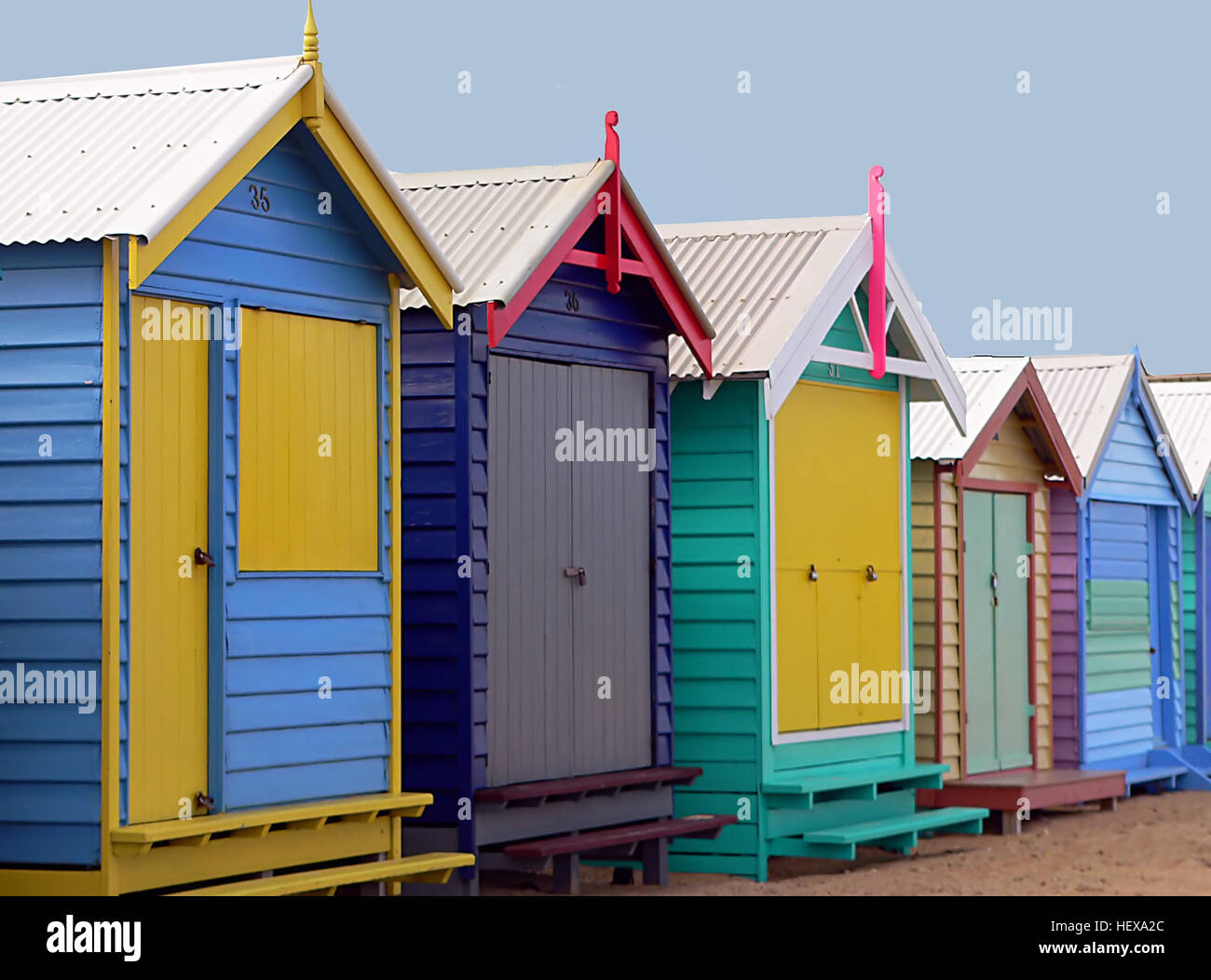 This vibrant image showcases the iconic coloured bathing boxes at ...