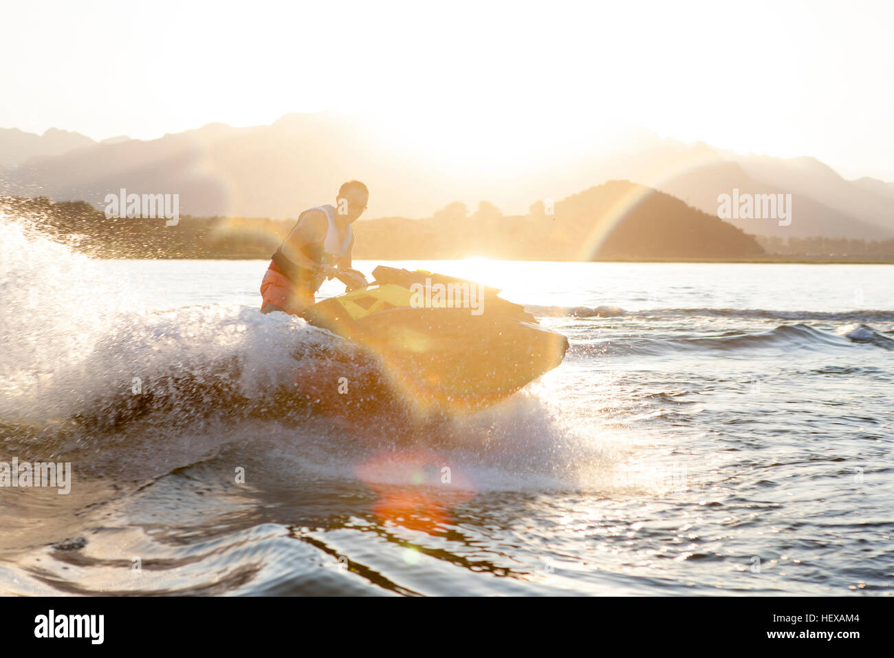Man riding boat hi-res stock photography and images - Alamy