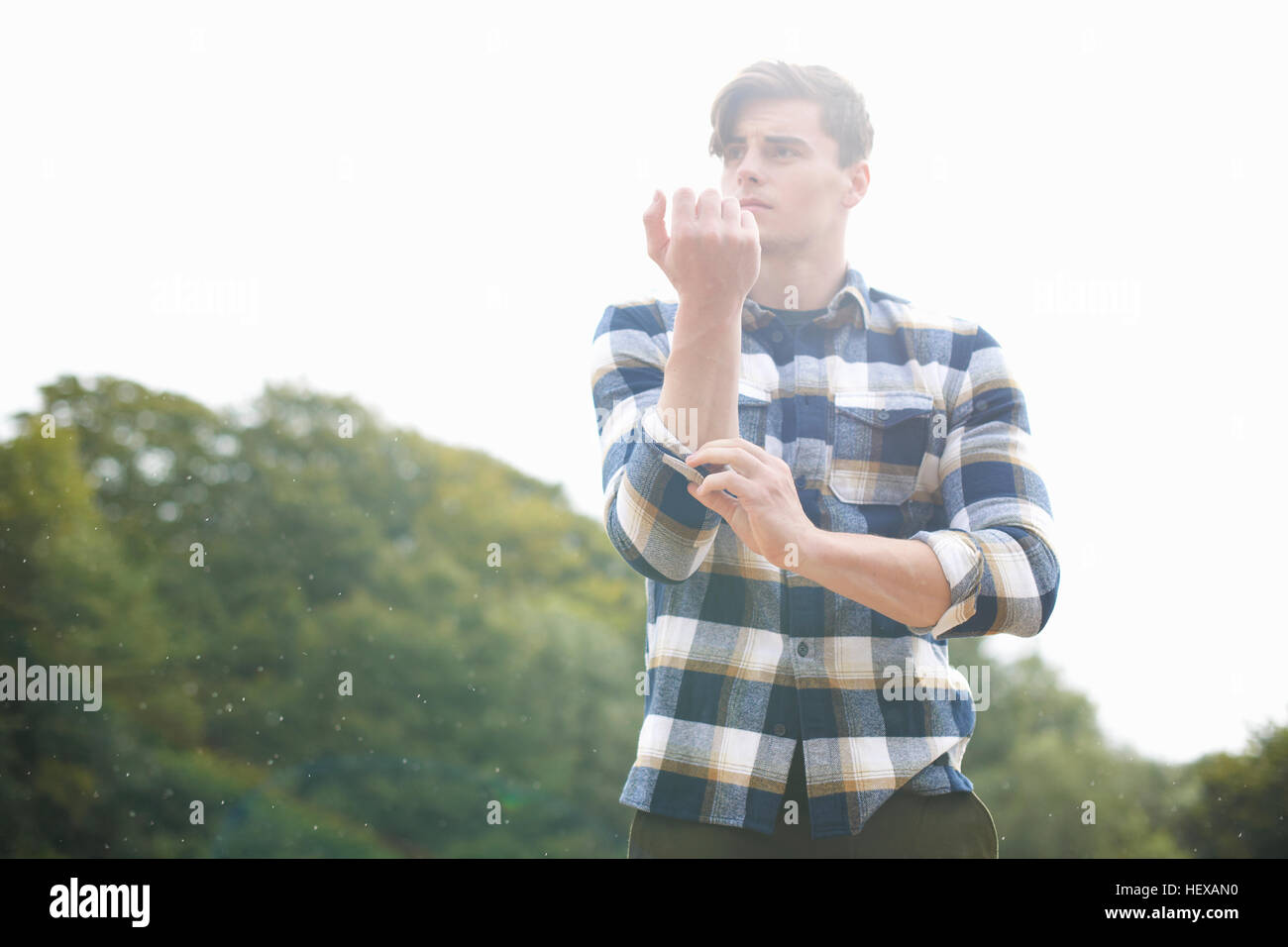 Person wearing plaid shirt hi-res stock photography and images - Alamy
