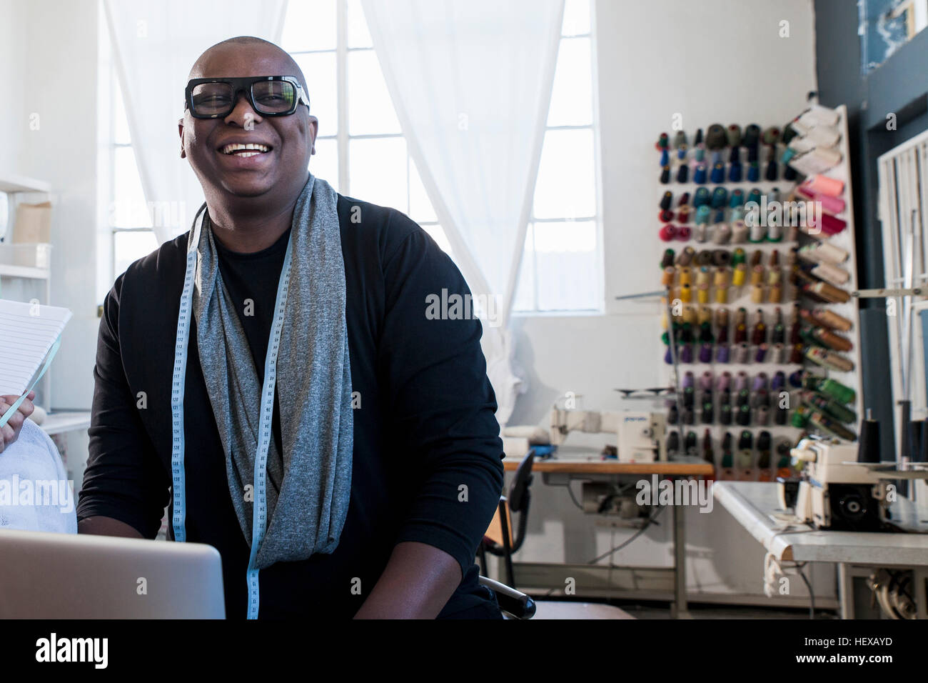 Portrait of male fashion designer in design studio Stock Photo - Alamy