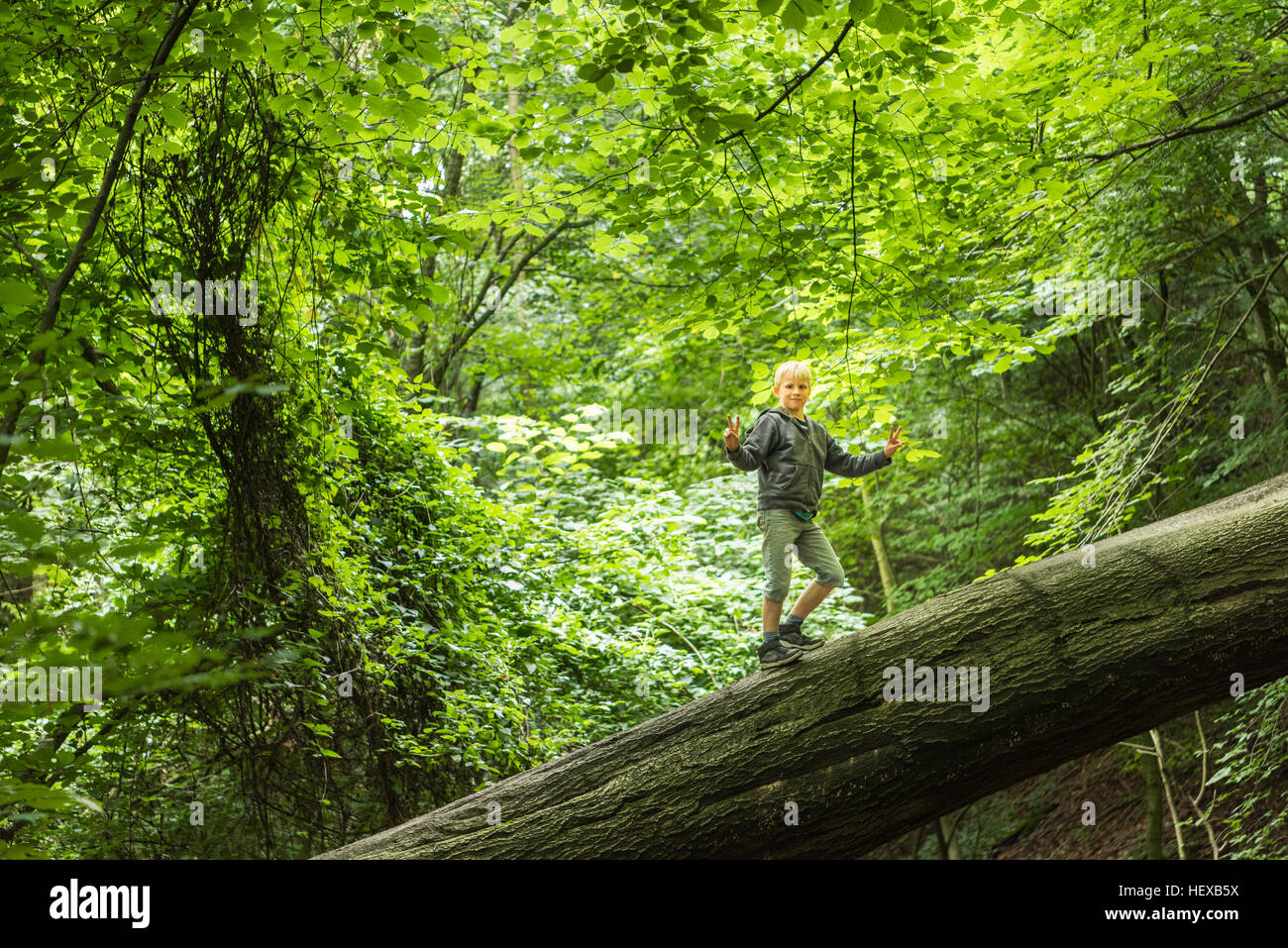 Boy balancing full length hi-res stock photography and images - Alamy