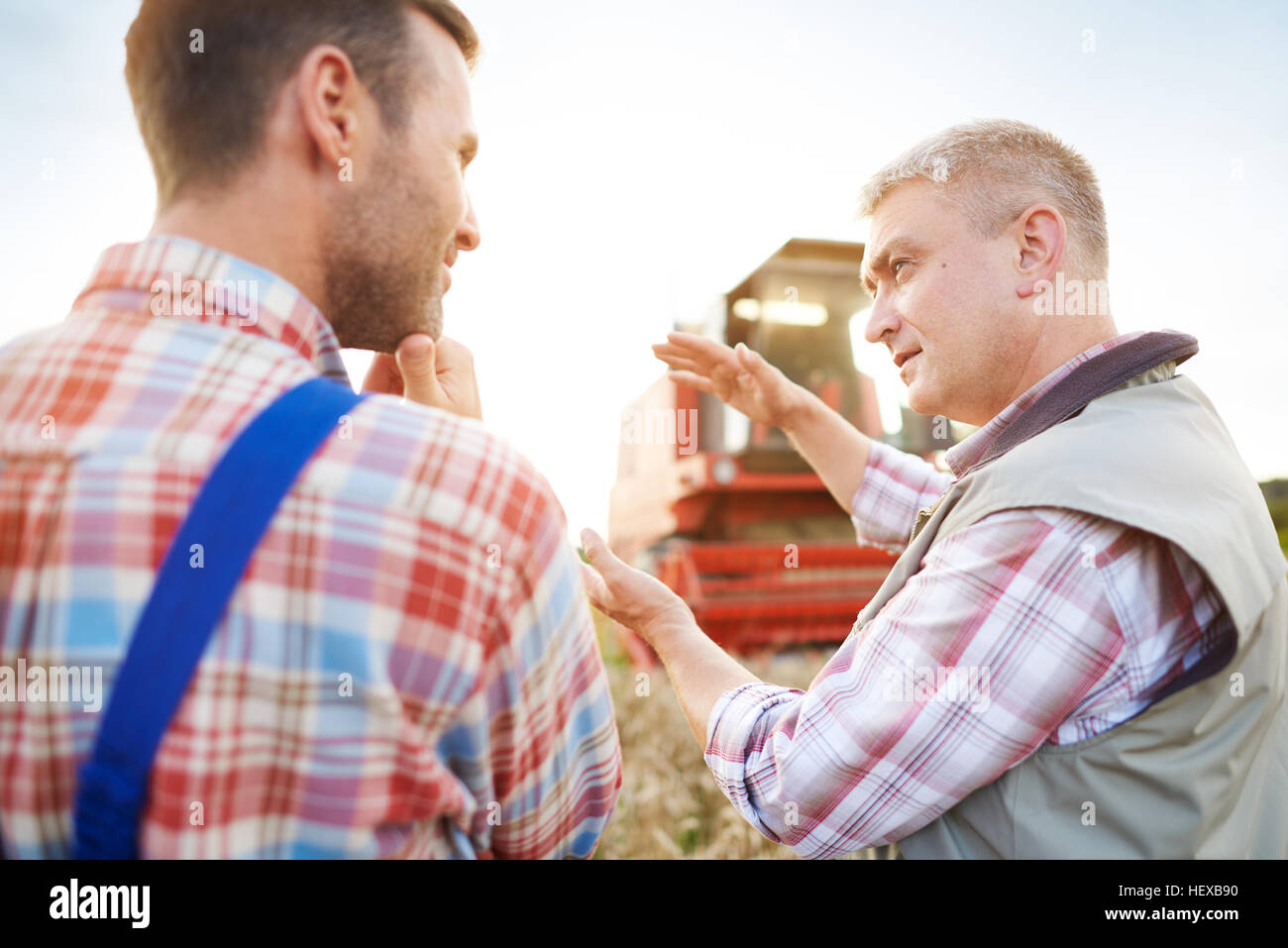 Farmers talking in field hi-res stock photography and images - Alamy