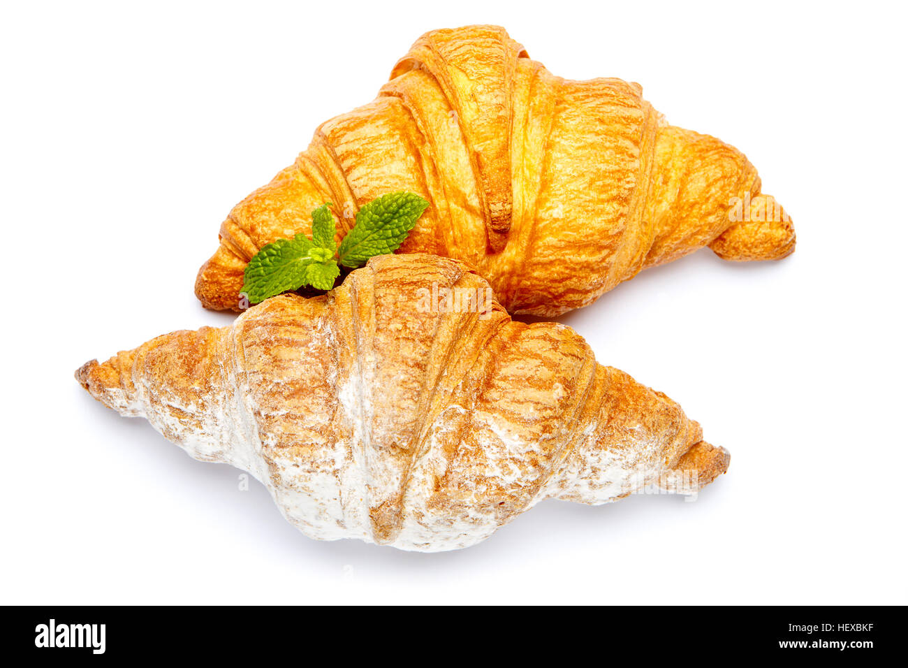 studio shot of two fresh croissants isolated on white background Stock ...