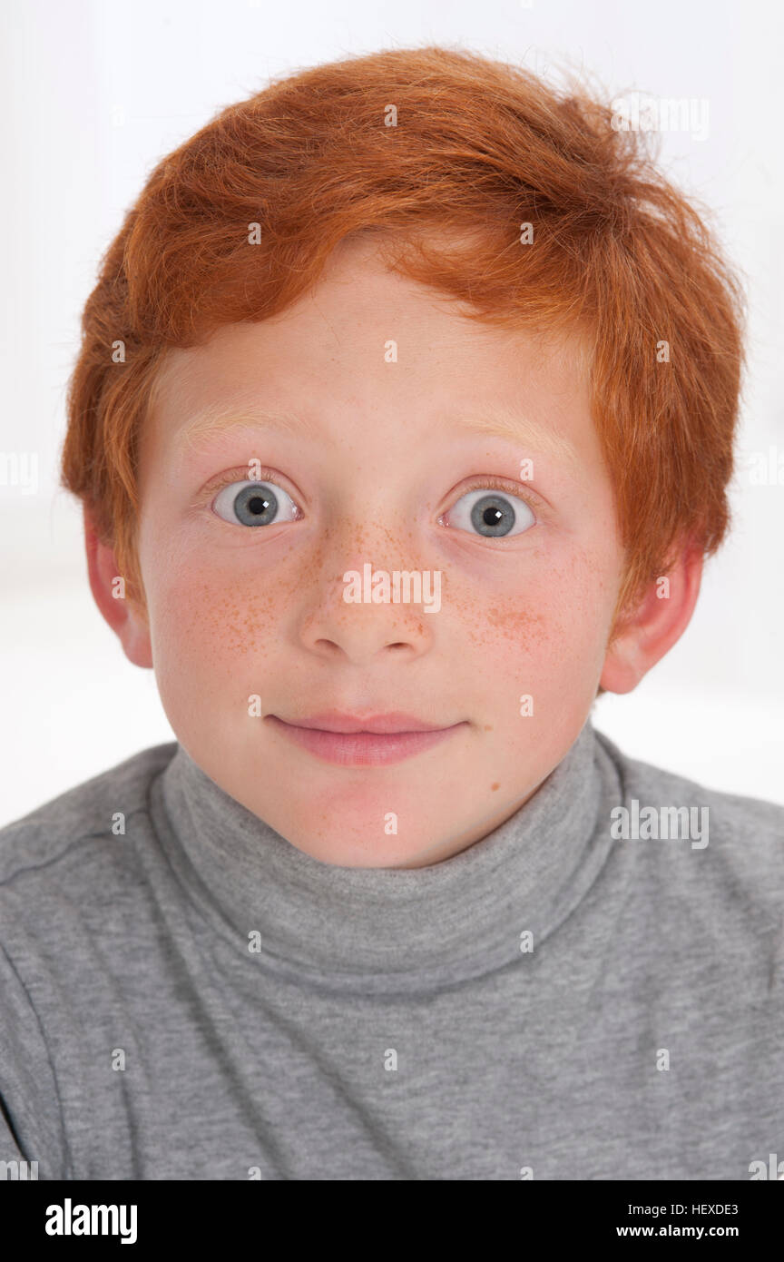 MODEL RELEASED. Portrait of a boy with red hair Stock Photo - Alamy