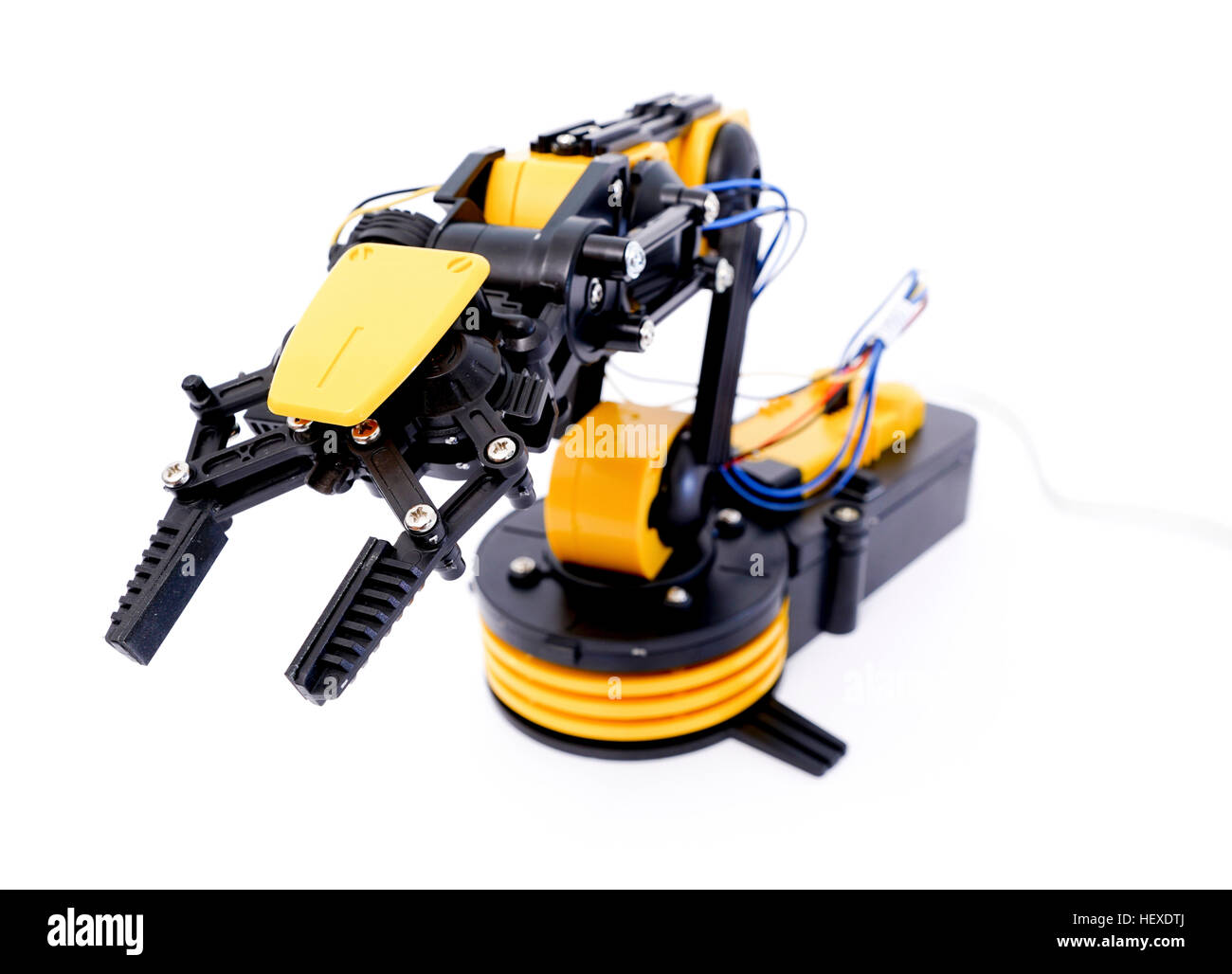 Robotic arm against a white background Stock Photo - Alamy