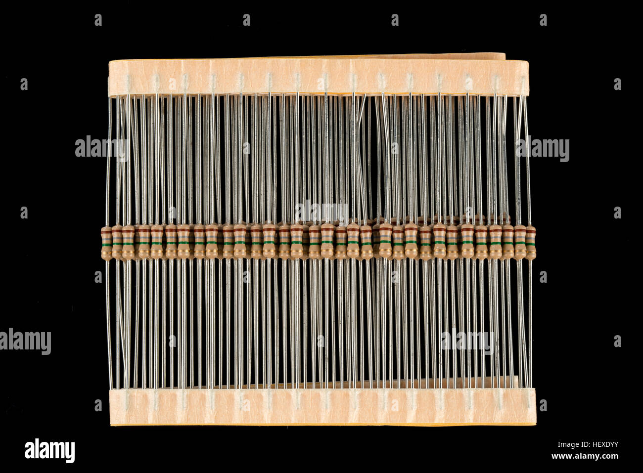 Electronic resistors against a black background Stock Photo - Alamy