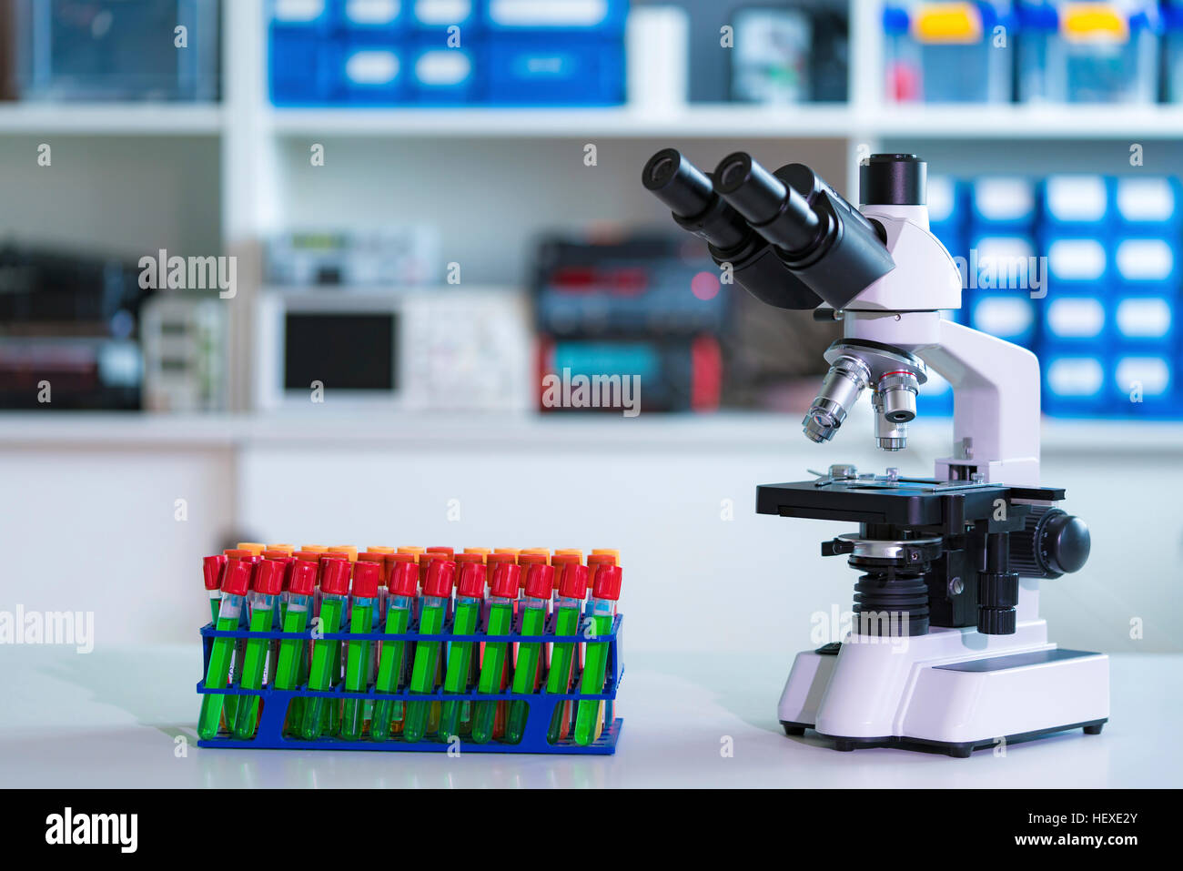 Laboratory microscope and test tubes Stock Photo - Alamy