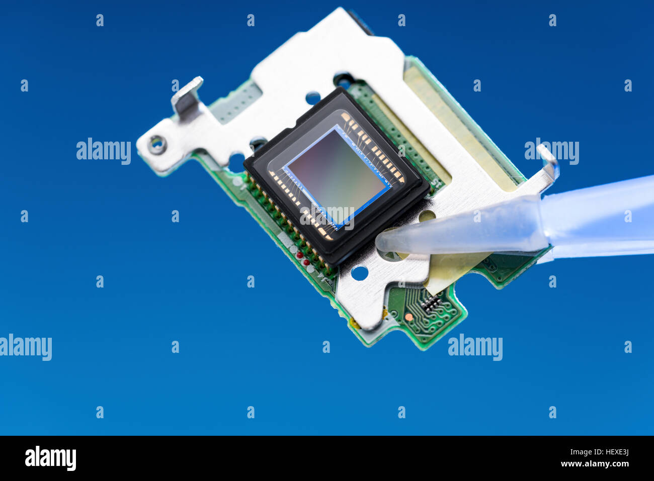 Image sensor against a blue background Stock Photo - Alamy