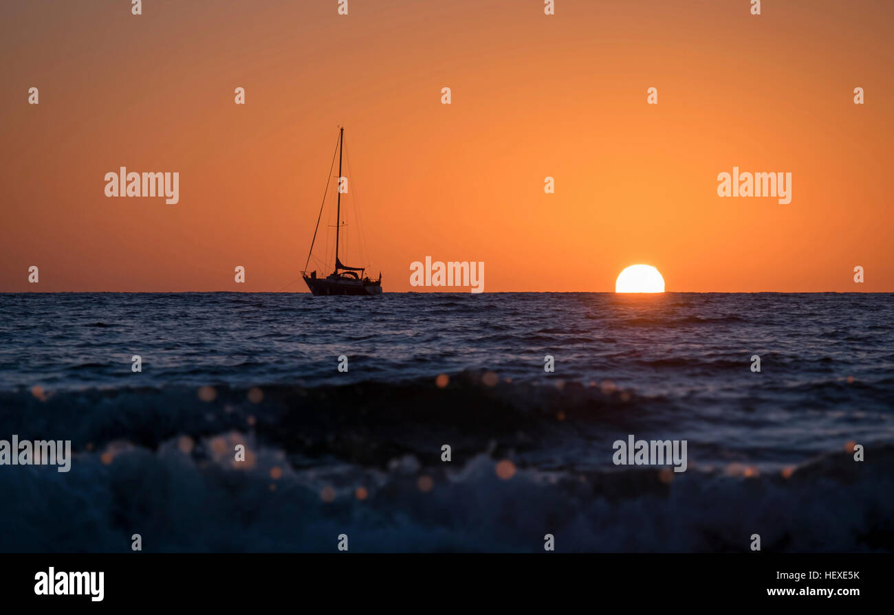 Sailboat sunset in ocean hi-res stock photography and images - Alamy