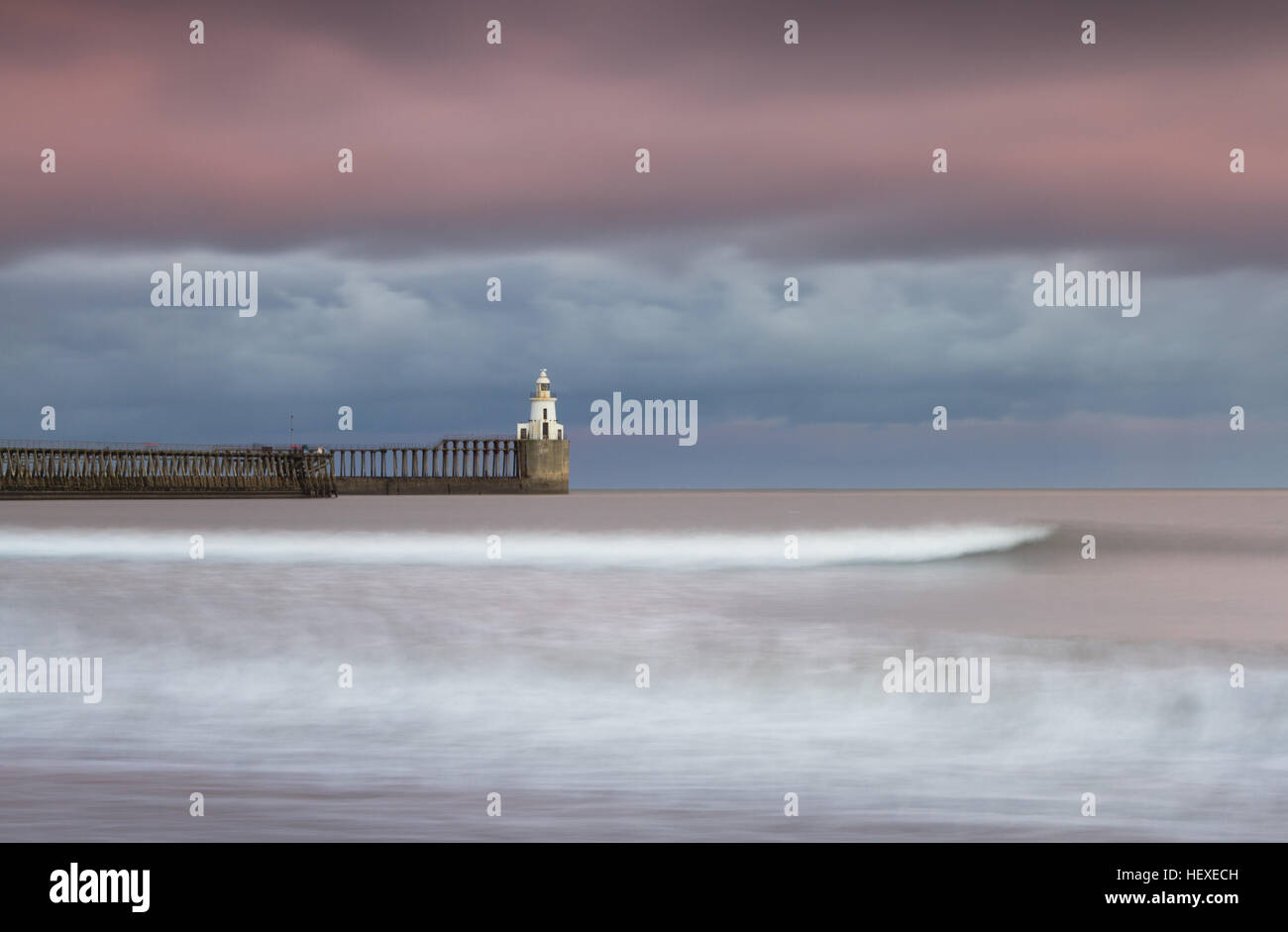 Blyth Pier and Lighthouse, Blyth Harbour, Northumberland, with rolling ...