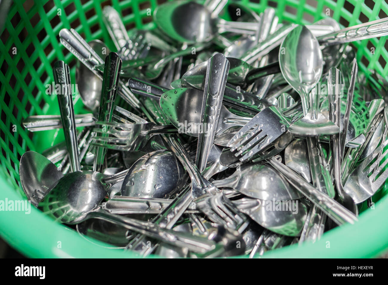 fork and spoon after washing Stock Photo - Alamy