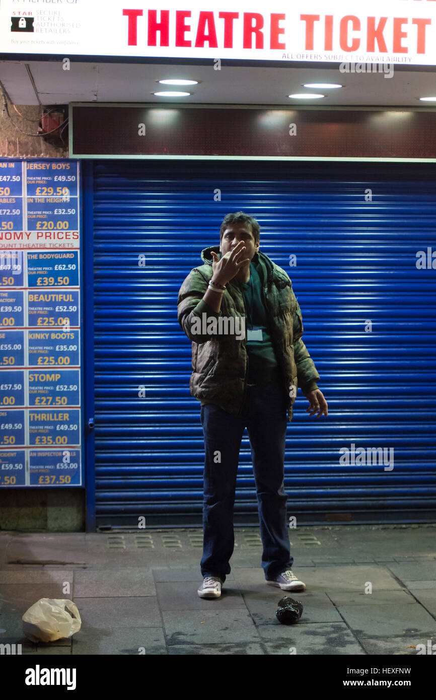 A reveller in Leicester square on the last Friday before Christmas ...