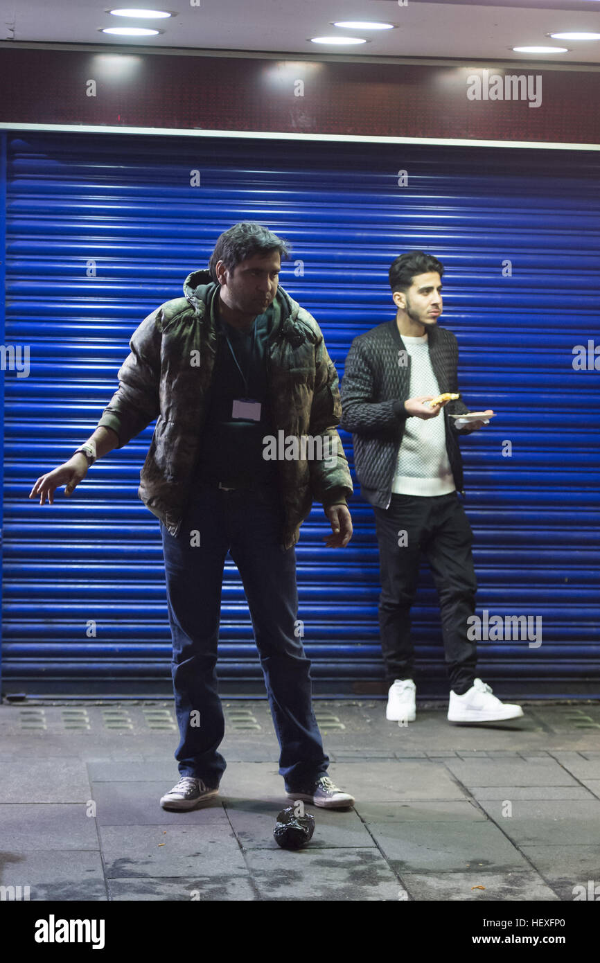 A reveller in Leicester square on the last Friday before Christmas ...