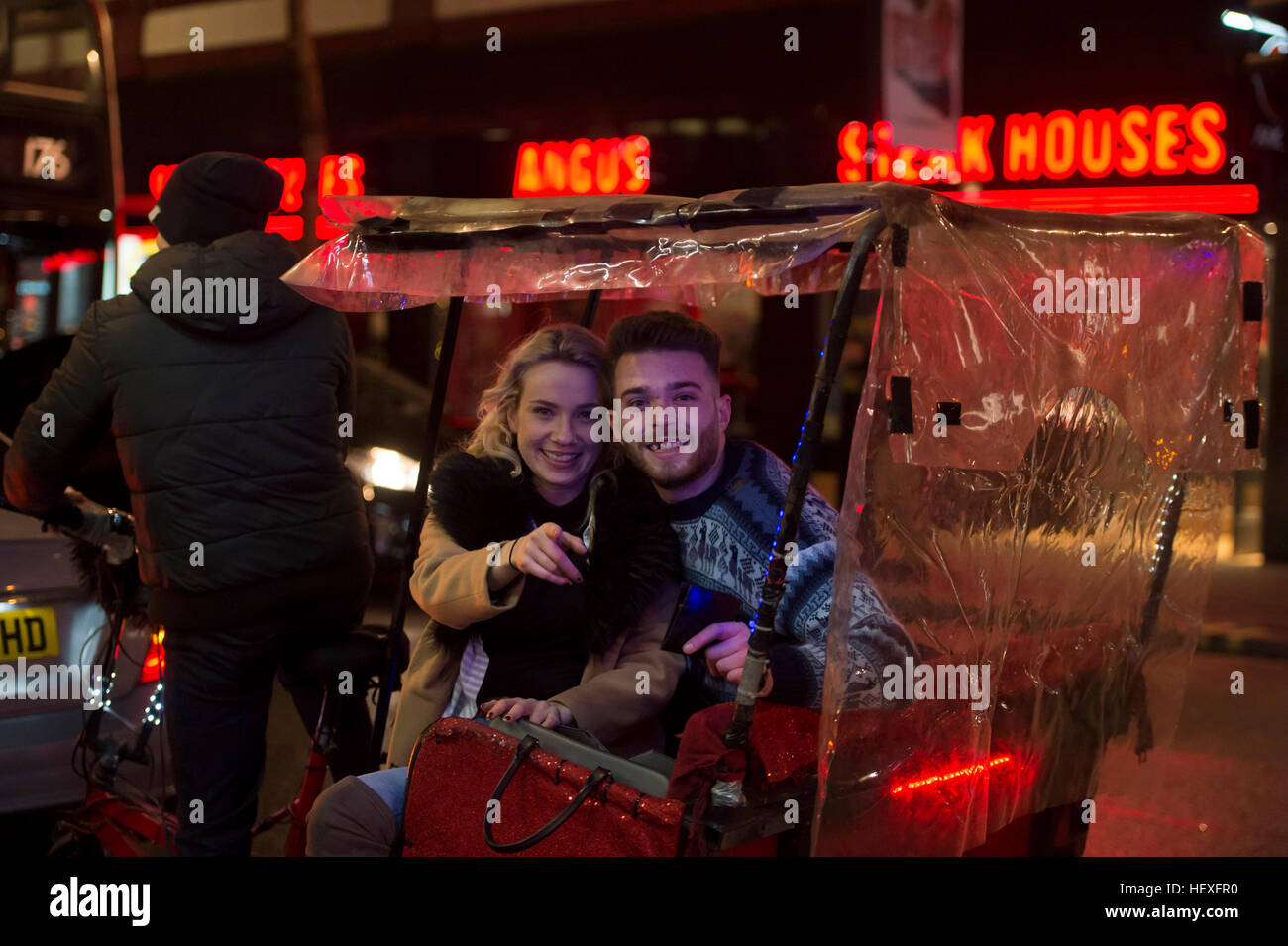 Revellers in Leicester square on the last Friday before Christmas Stock ...