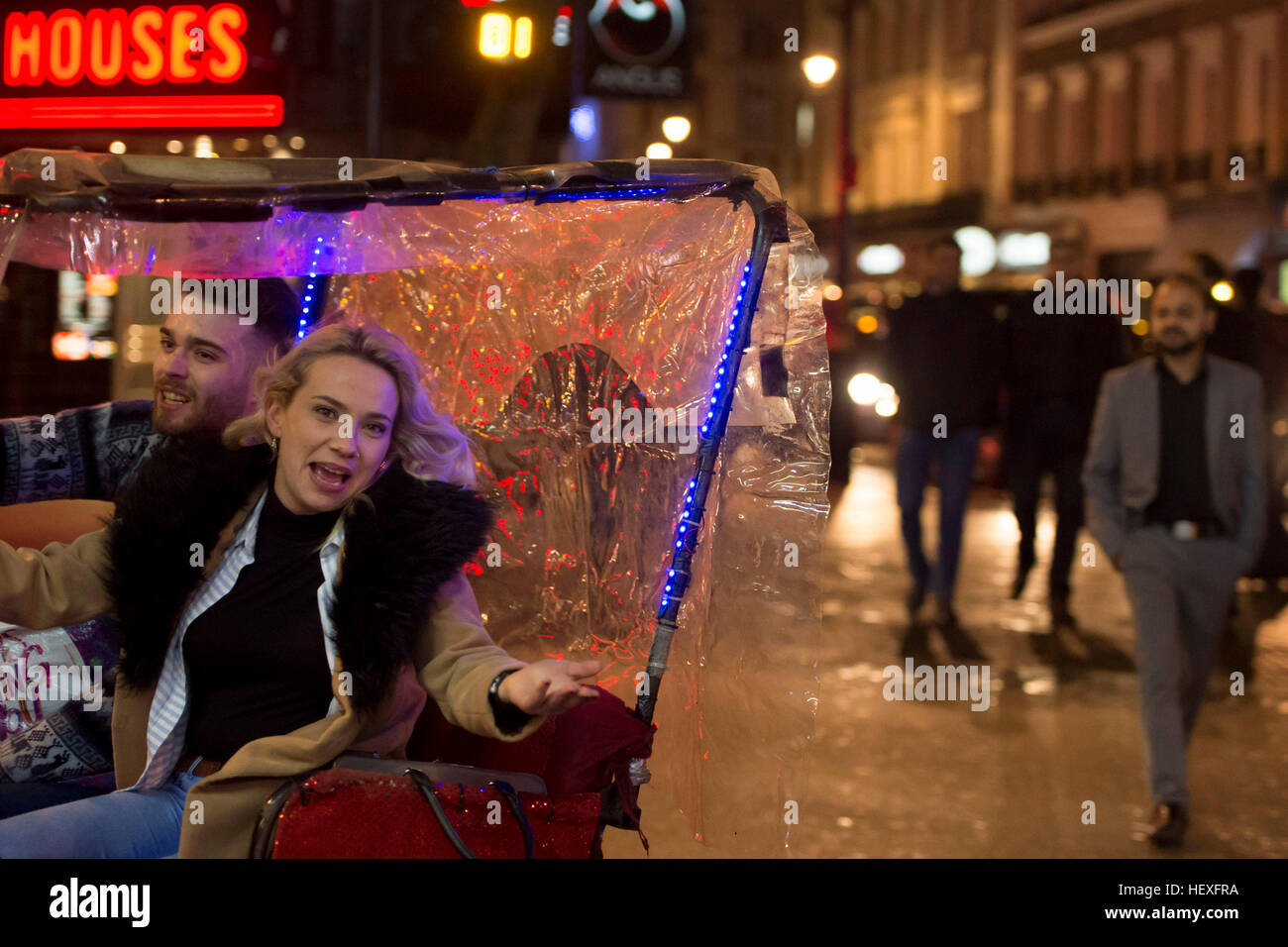 Revellers in Leicester square on the last Friday before Christmas Stock ...