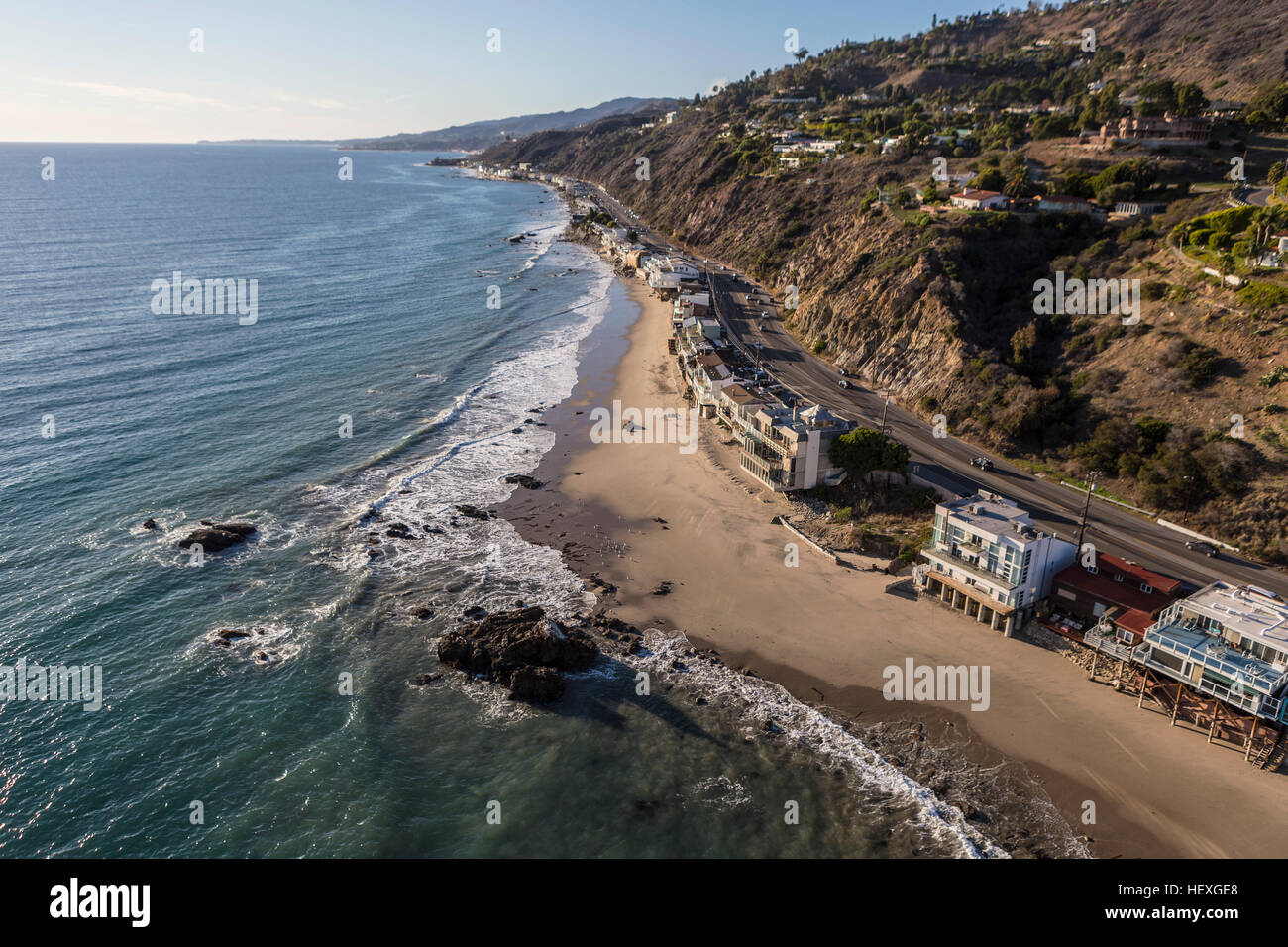 Aerial of beachfront homes Pacific Coast Highway in Malibu California ...