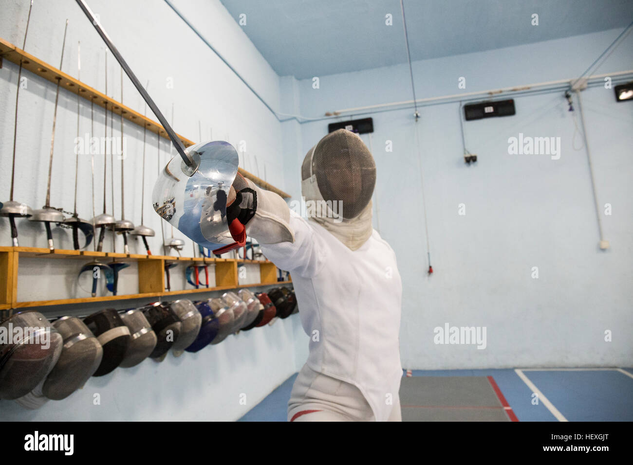 Female fencer with weapon Stock Photo - Alamy