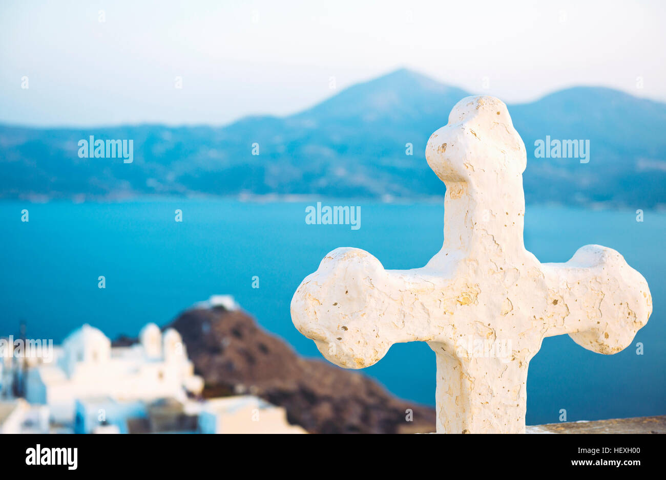 Greece, Milos, Church cross over Plaka Stock Photo - Alamy