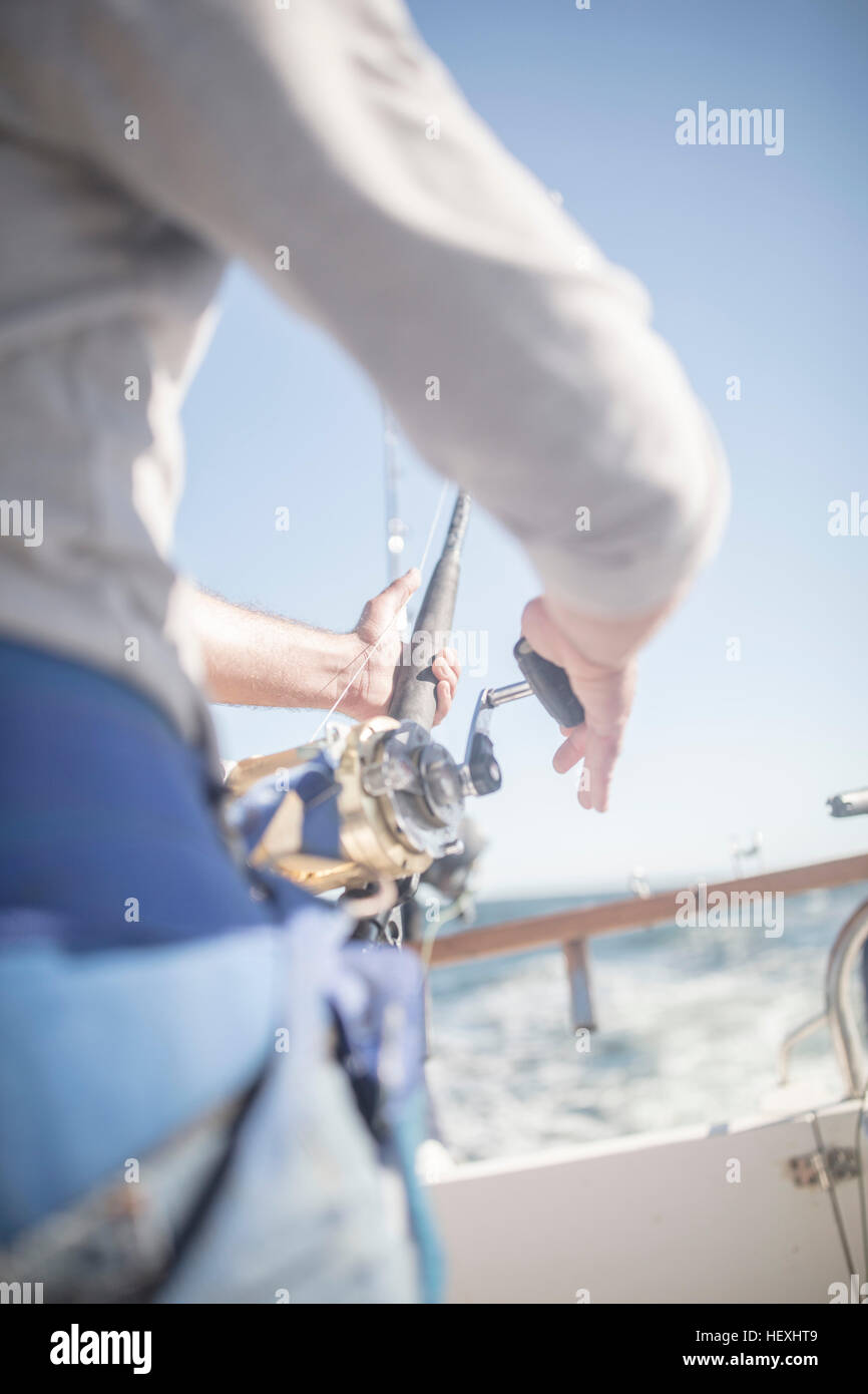 Man on boat hi-res stock photography and images - Alamy