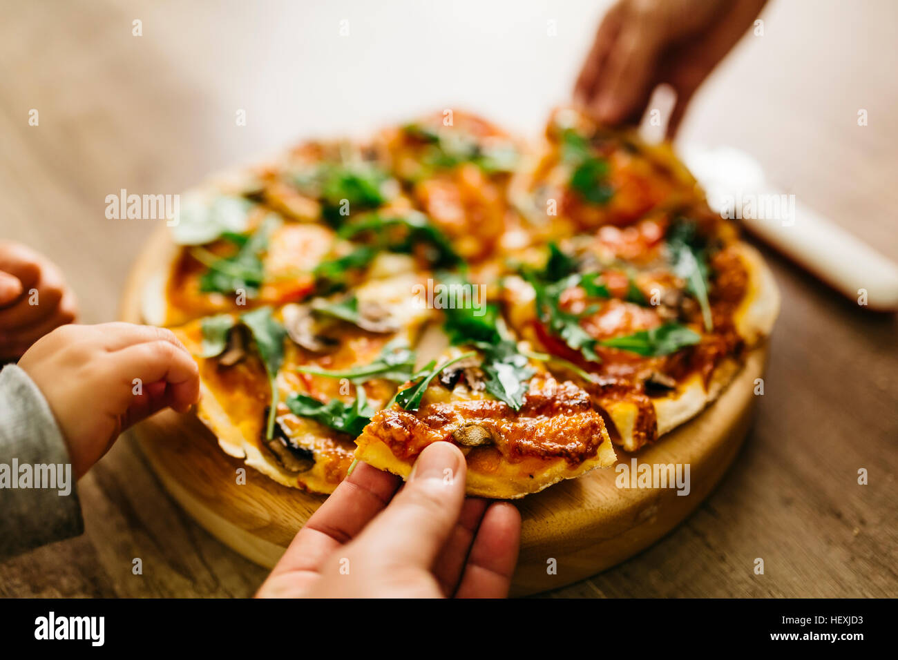 Close up picking pizza hi-res stock photography and images - Alamy