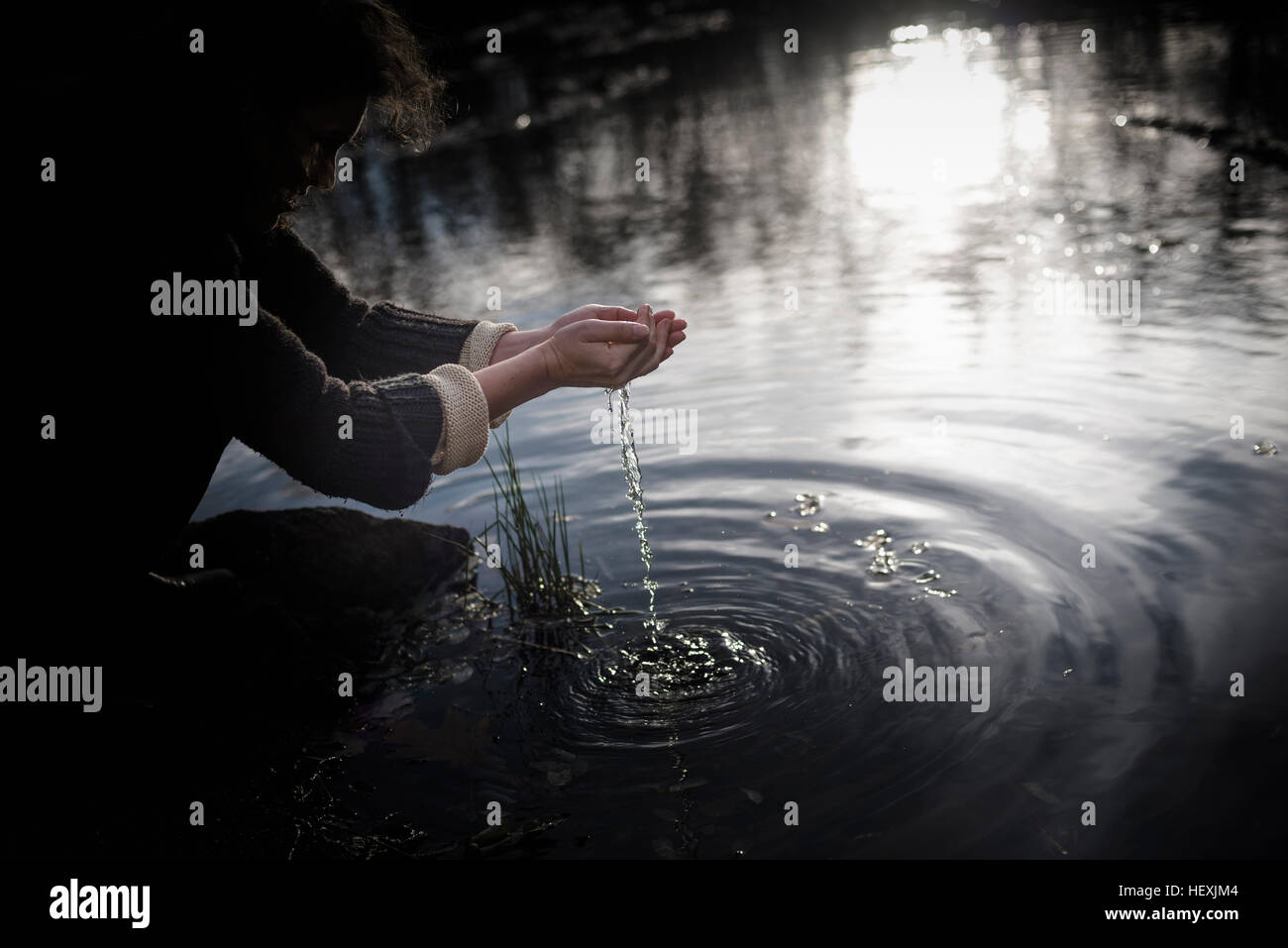 Hands scooping water hi-res stock photography and images - Alamy