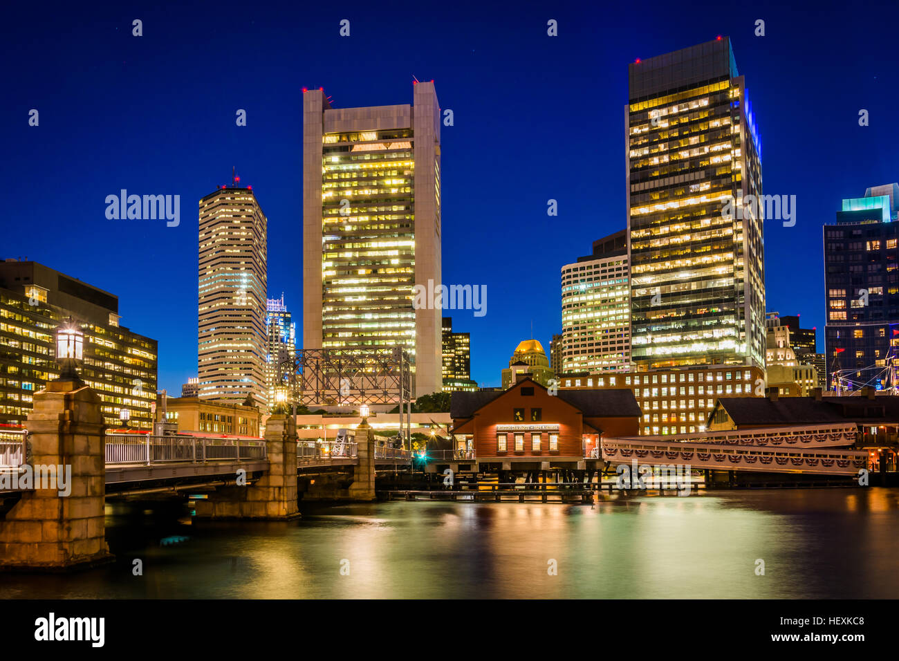 The Boston skyline and Fort Point Channel at night, in Boston ...
