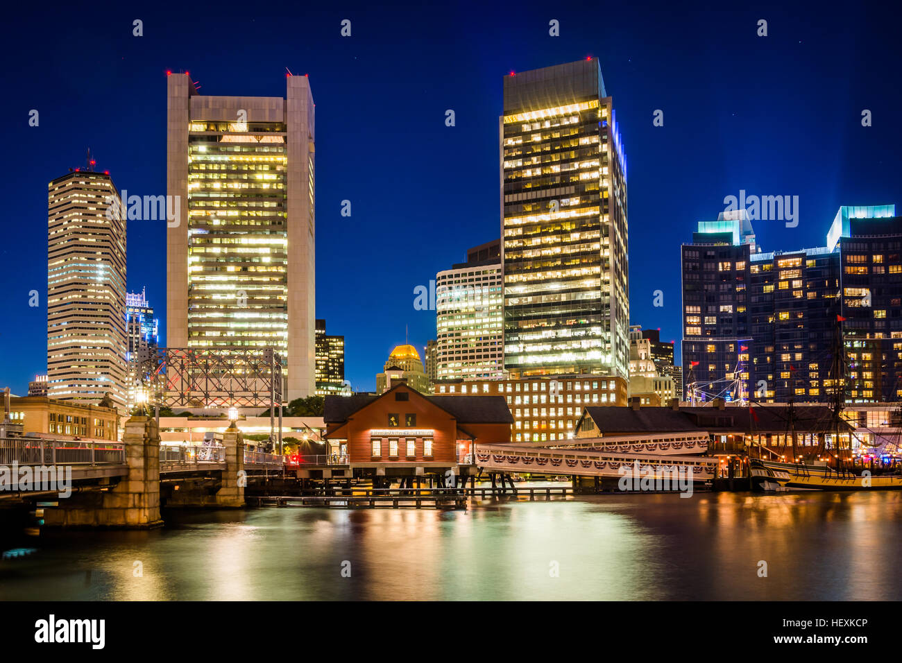 The Boston skyline and Fort Point Channel at night, in Boston ...